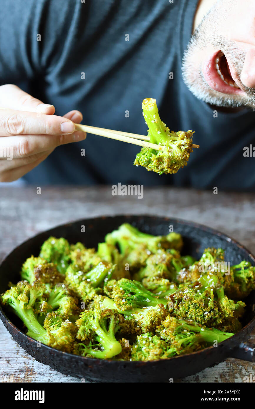 Boy eating dinner mouth open hi-res stock photography and images - Alamy