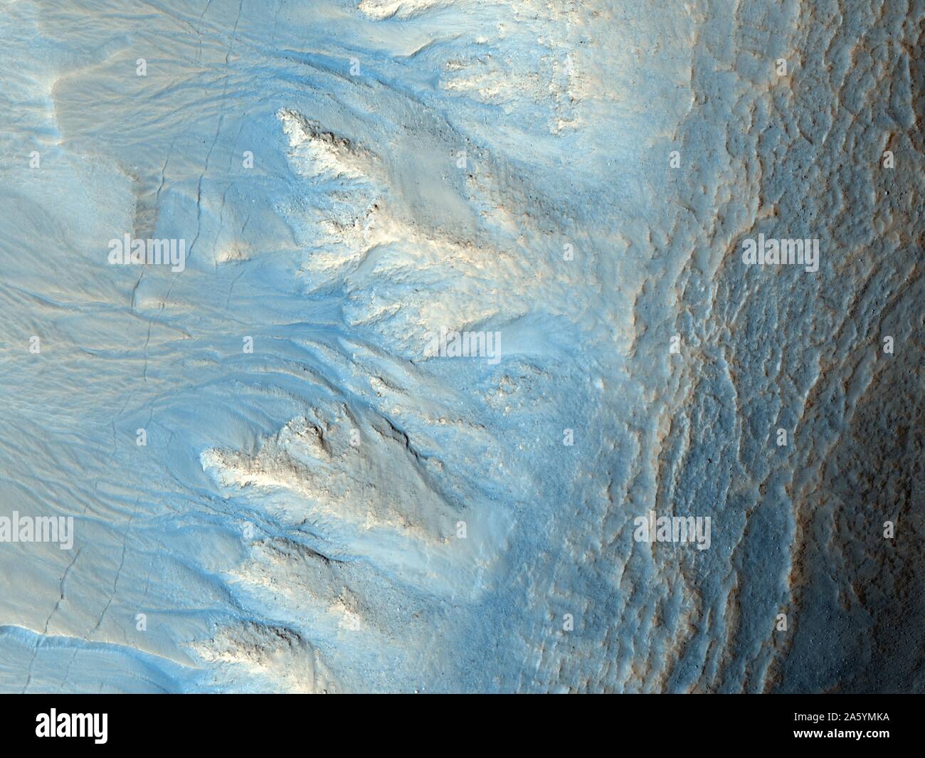 This image shows the west-facing side of an impact crater in the mid ...
