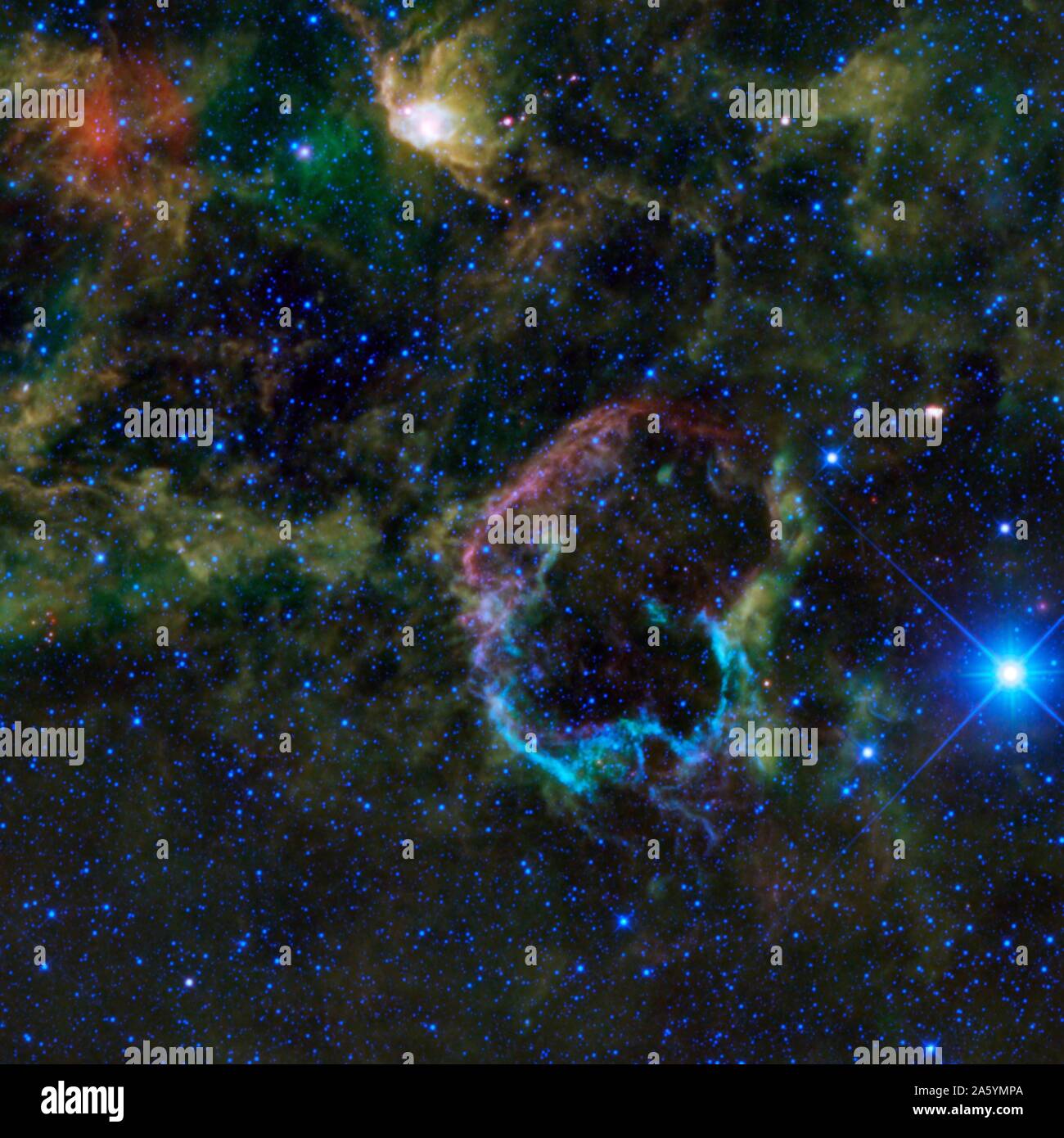 This oddly colorful nebula is the supernova remnant IC 443 as seen by ...