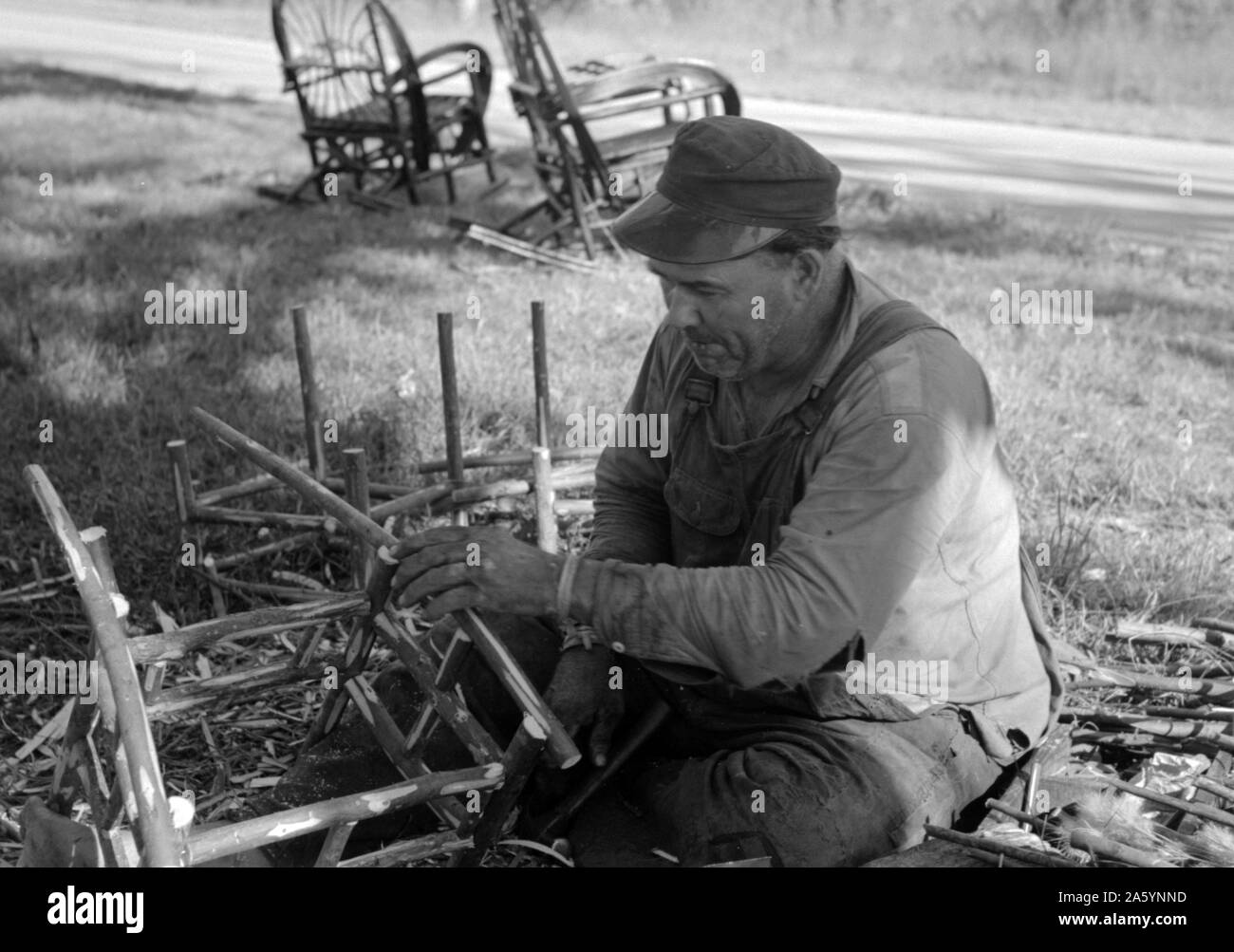 Migrant worker making cane chairs, near Paradis, Louisiana by Russell ...