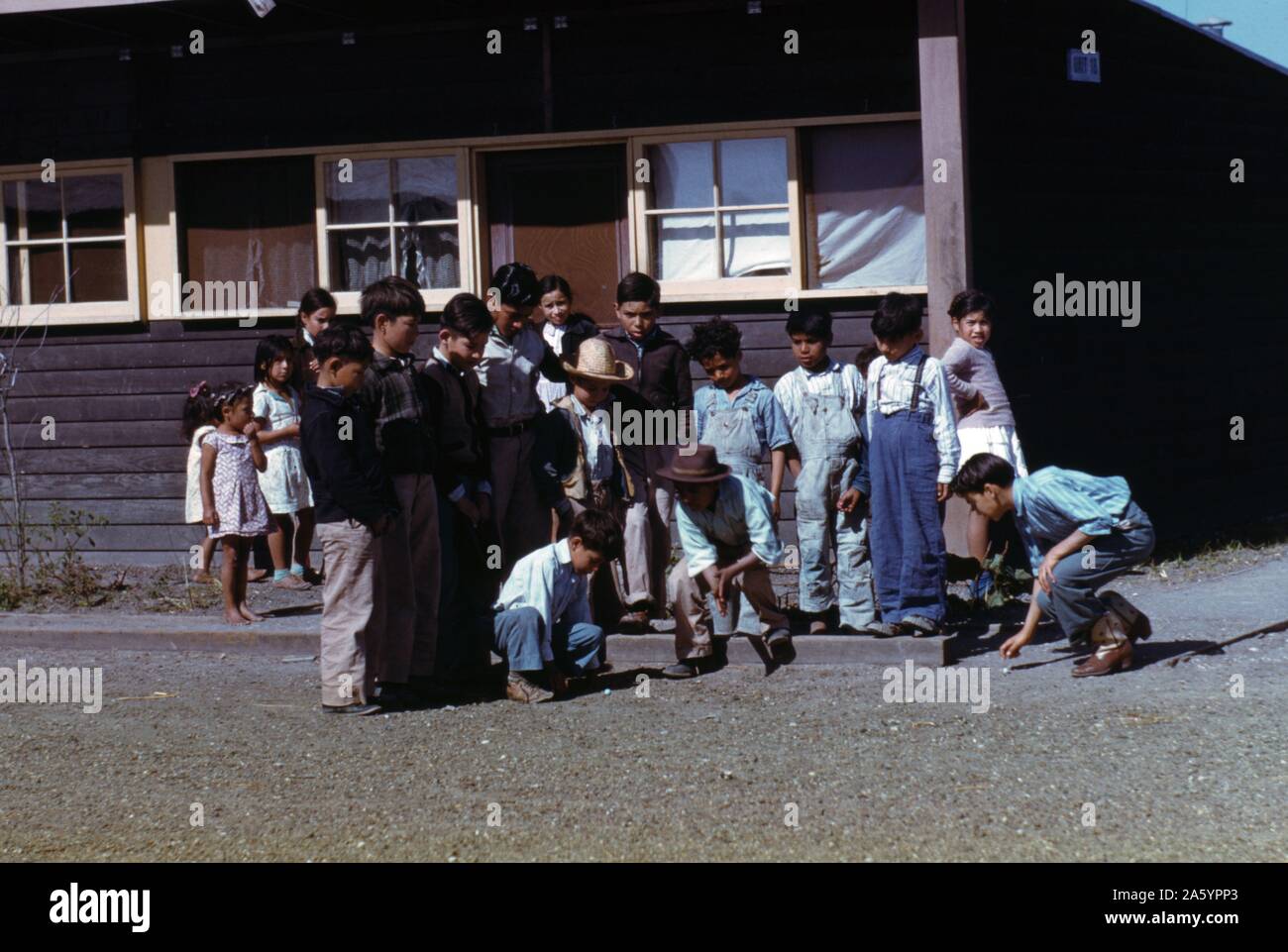 Boys playing marbles, labour camp, Robstown, Texas, USA. Photographer ...