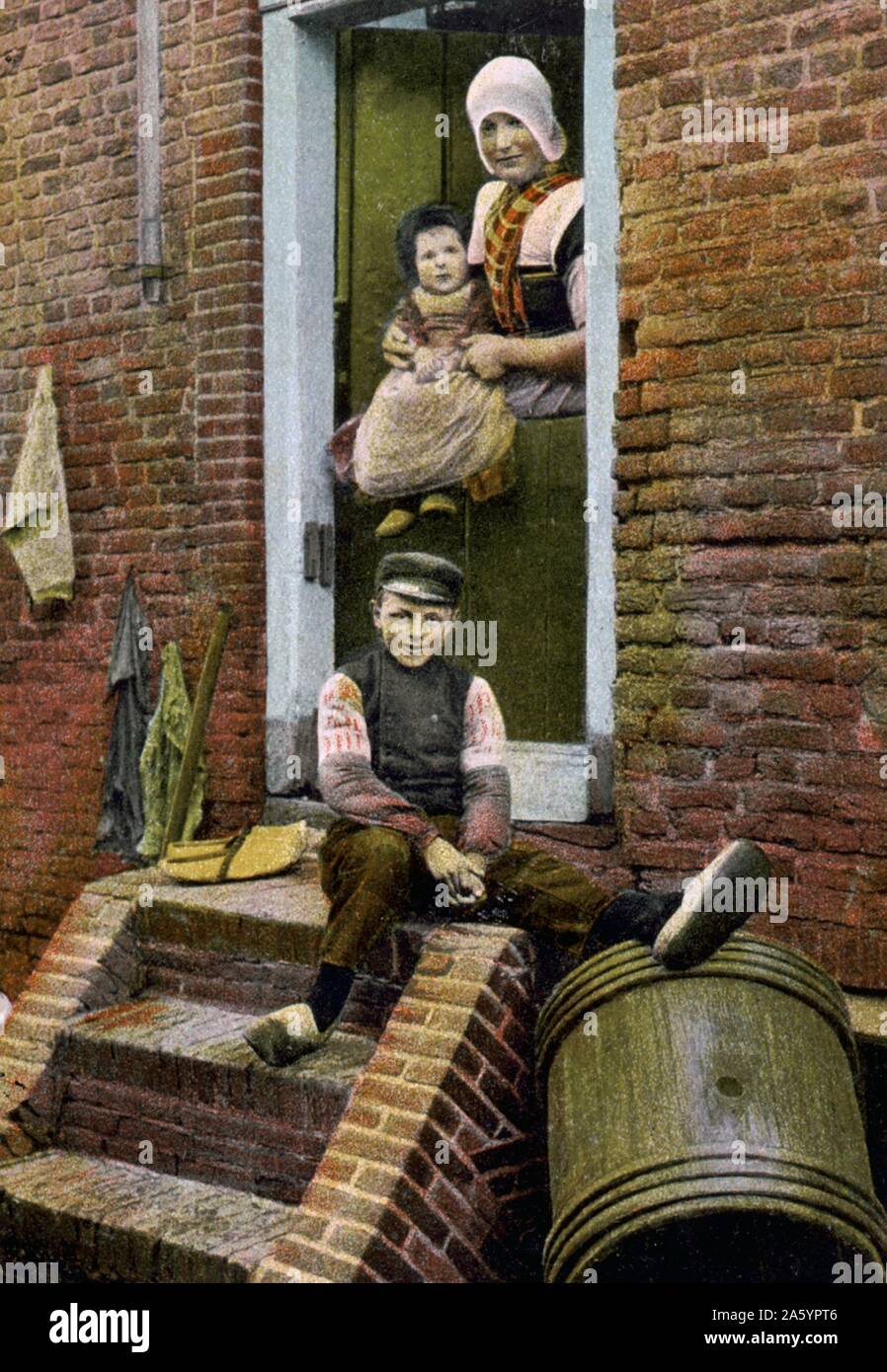 Dutch family in the doorway of their home 1890 Stock Photo - Alamy