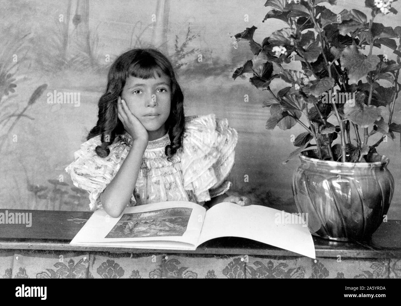 Daughter of Thomas E Askew, head-and-shoulders portrait, seated, right ...