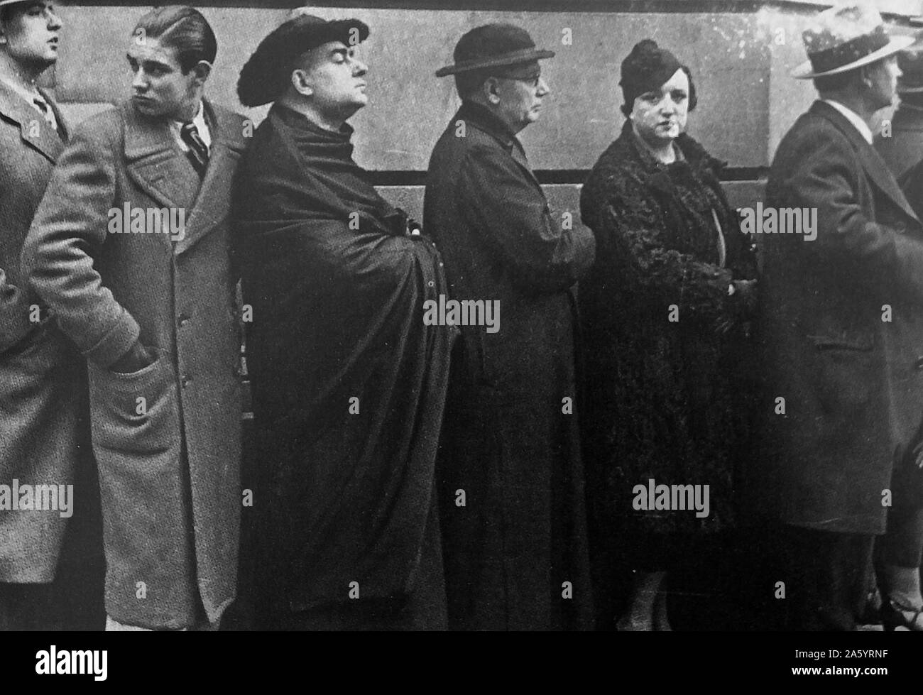 Voters line up to vote in Madrid, Spain during the 1936 election Stock ...