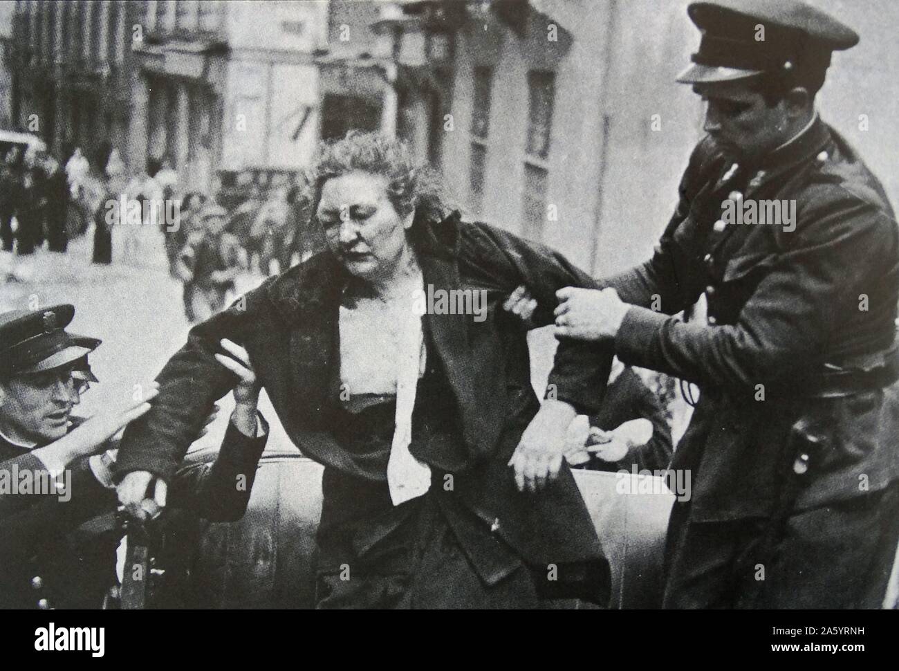 Spanish woman is injured and helped by Assault guards in Madrid during ...