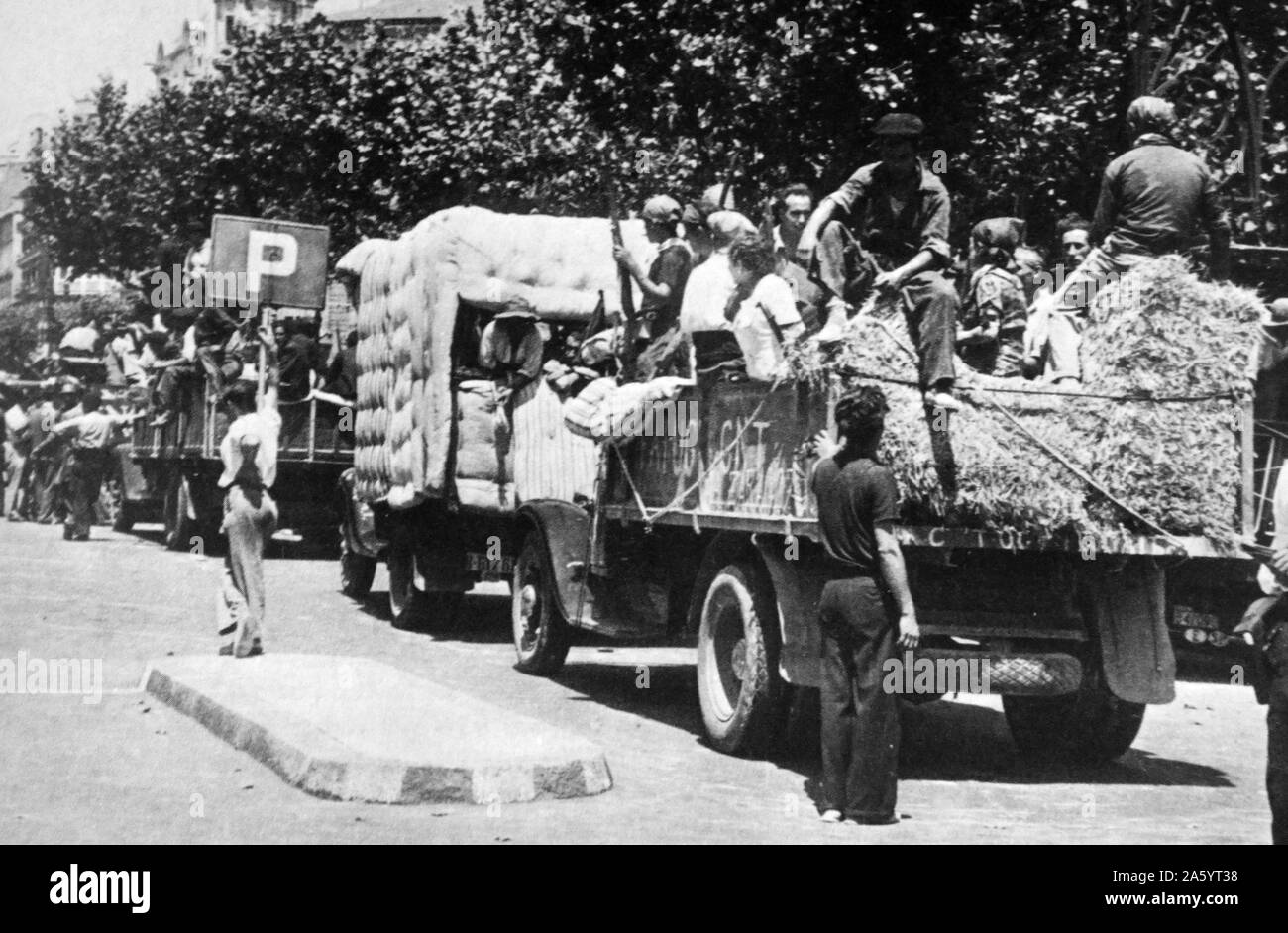 Civil volunteers take up positions in central Barcelona in the summer ...