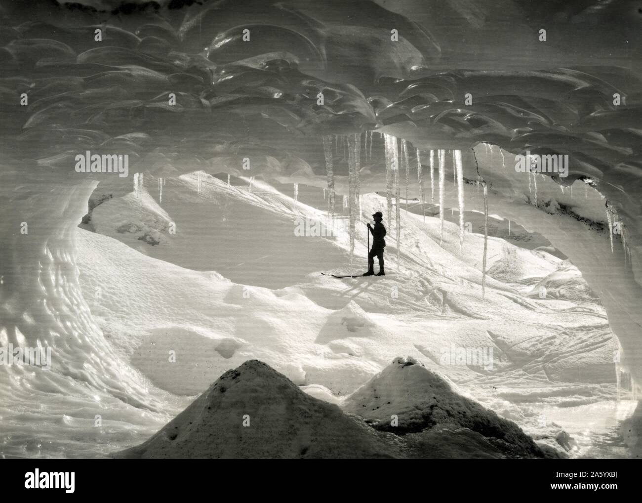 Photograph of an ice cave in the Tasman Glacier. Dated 1903 Stock Photo ...