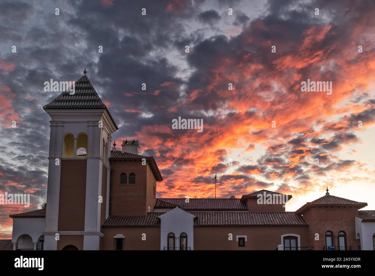 gothic tower with extremely dramatic sunset sky Stock Photo - Alamy