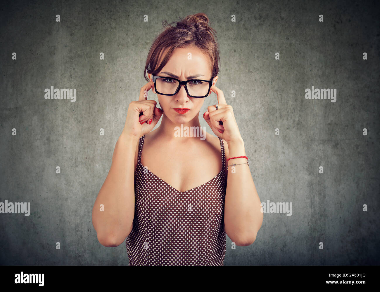 Annoyed young woman doesn't want to listen Stock Photo - Alamy