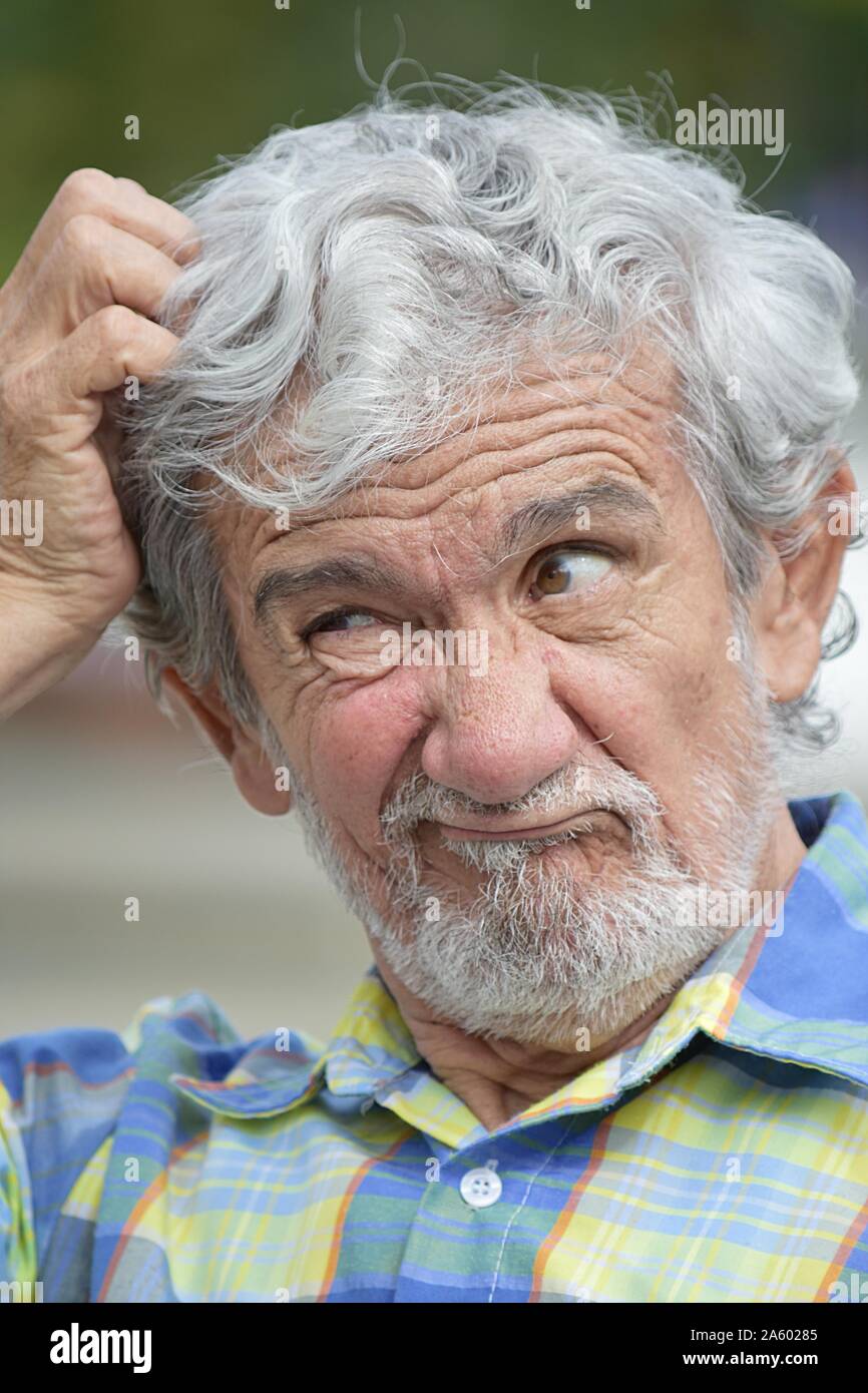 Bearded Old Male And Confusion Stock Photo - Alamy