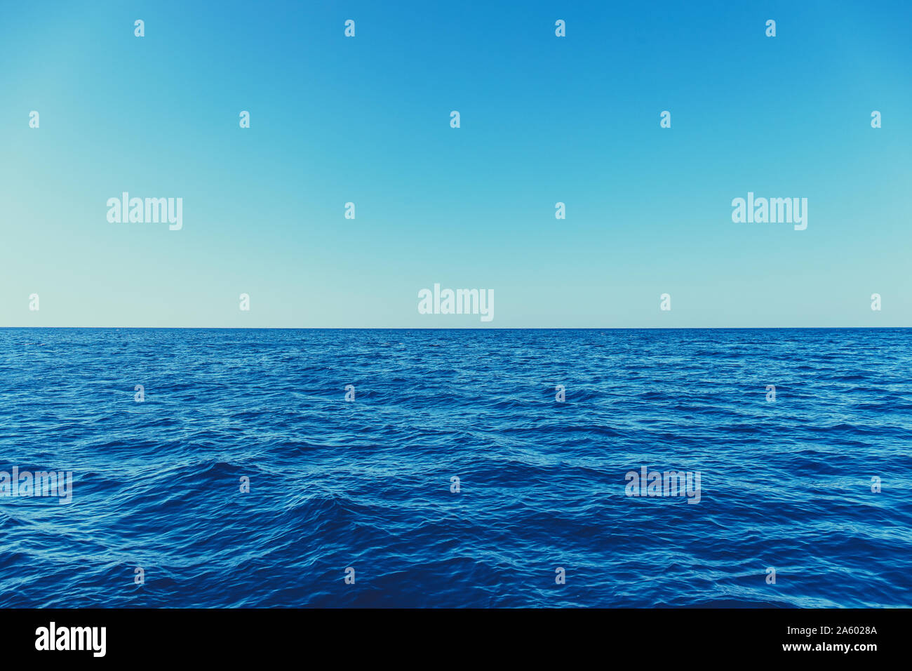Blue sea surface background with waves and horizon Stock Photo - Alamy