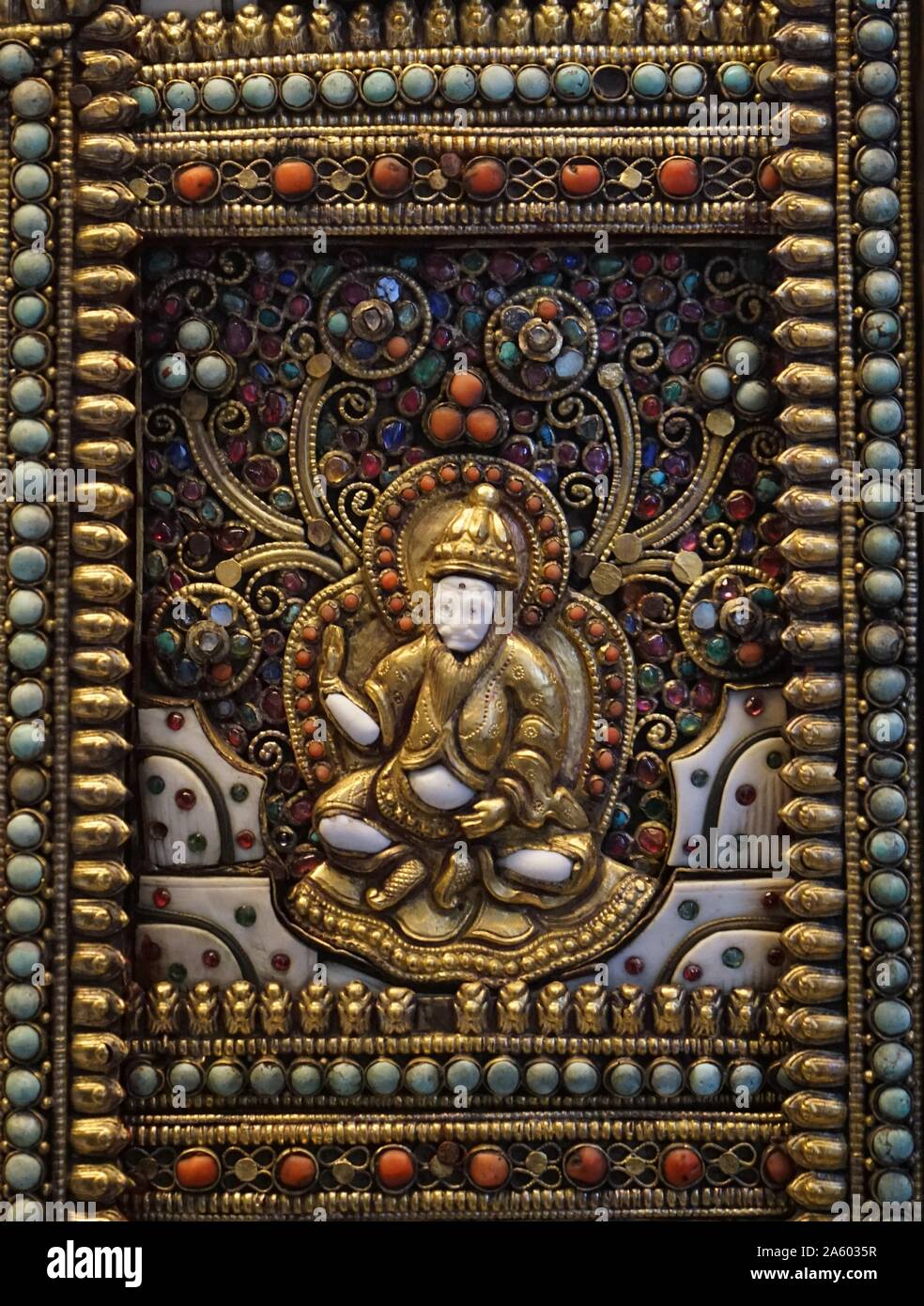 Altar screen of metal, set with bone, shell, precious and semi-precious ...