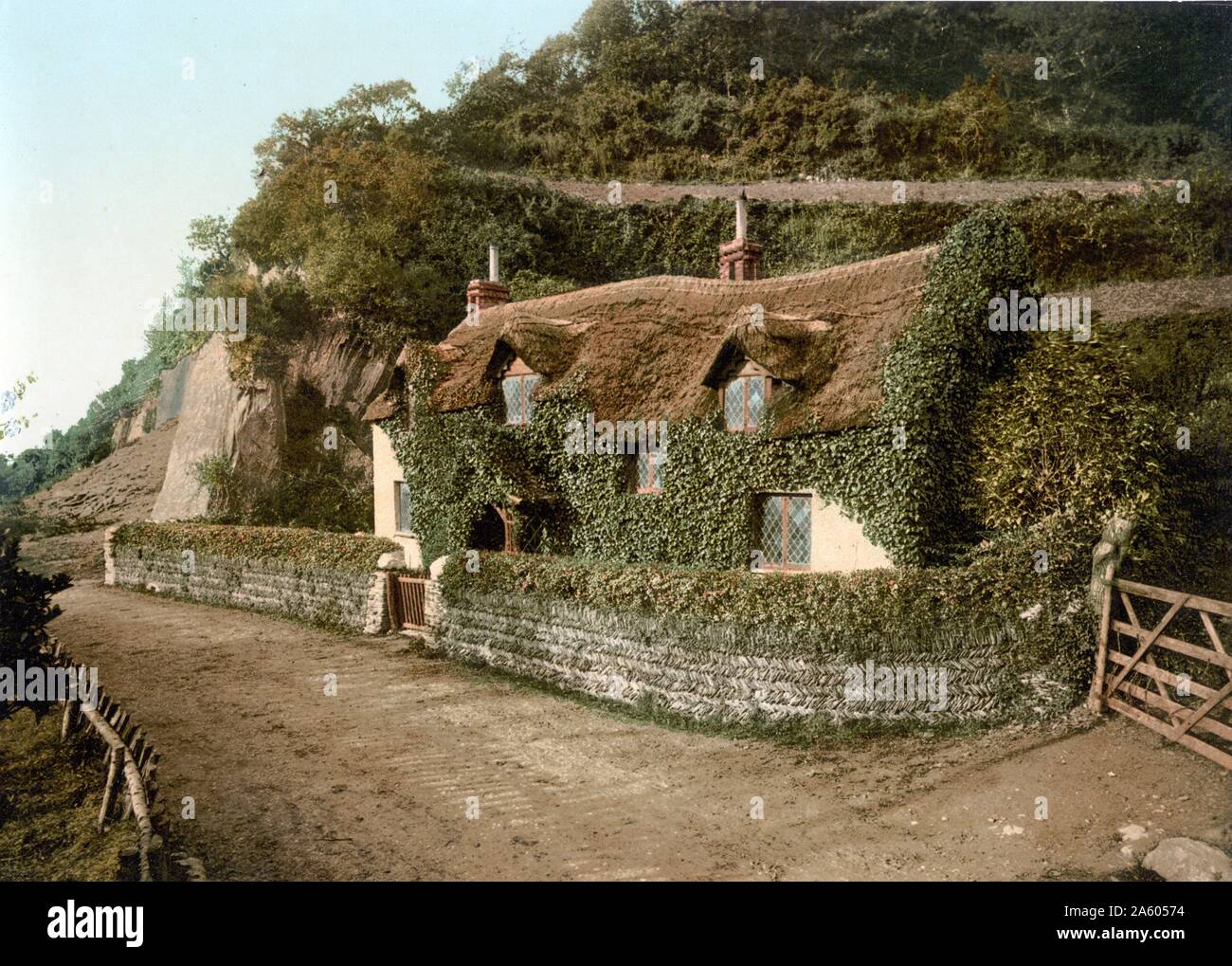 Photo shows an early Swiss cottage, in Devon, England. Shot around 1890 ...