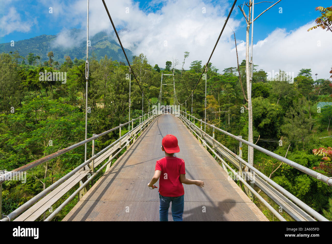 Boy river bridge woods hi-res stock photography and images - Alamy