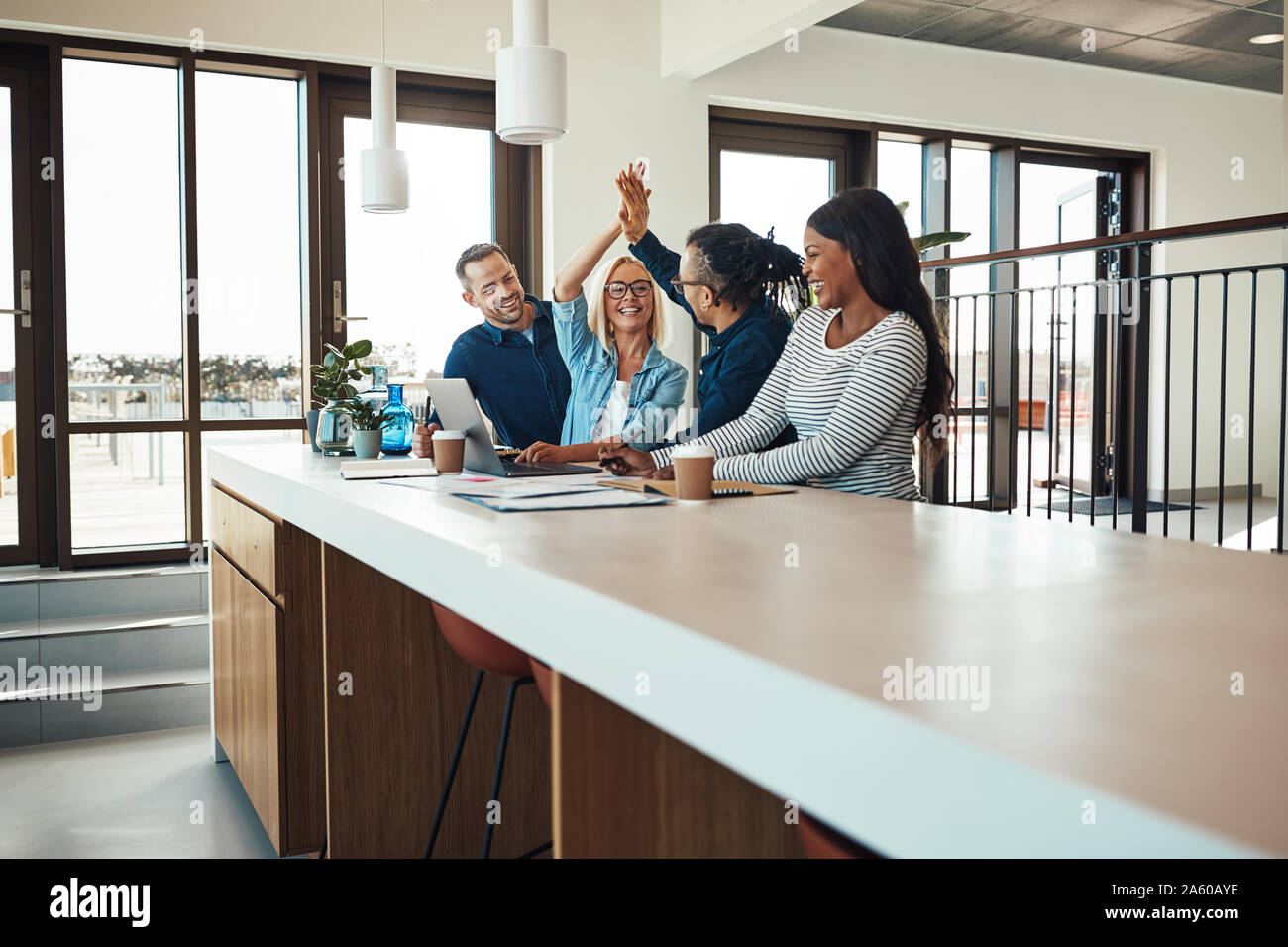 Girls high fiving hi-res stock photography and images - Alamy