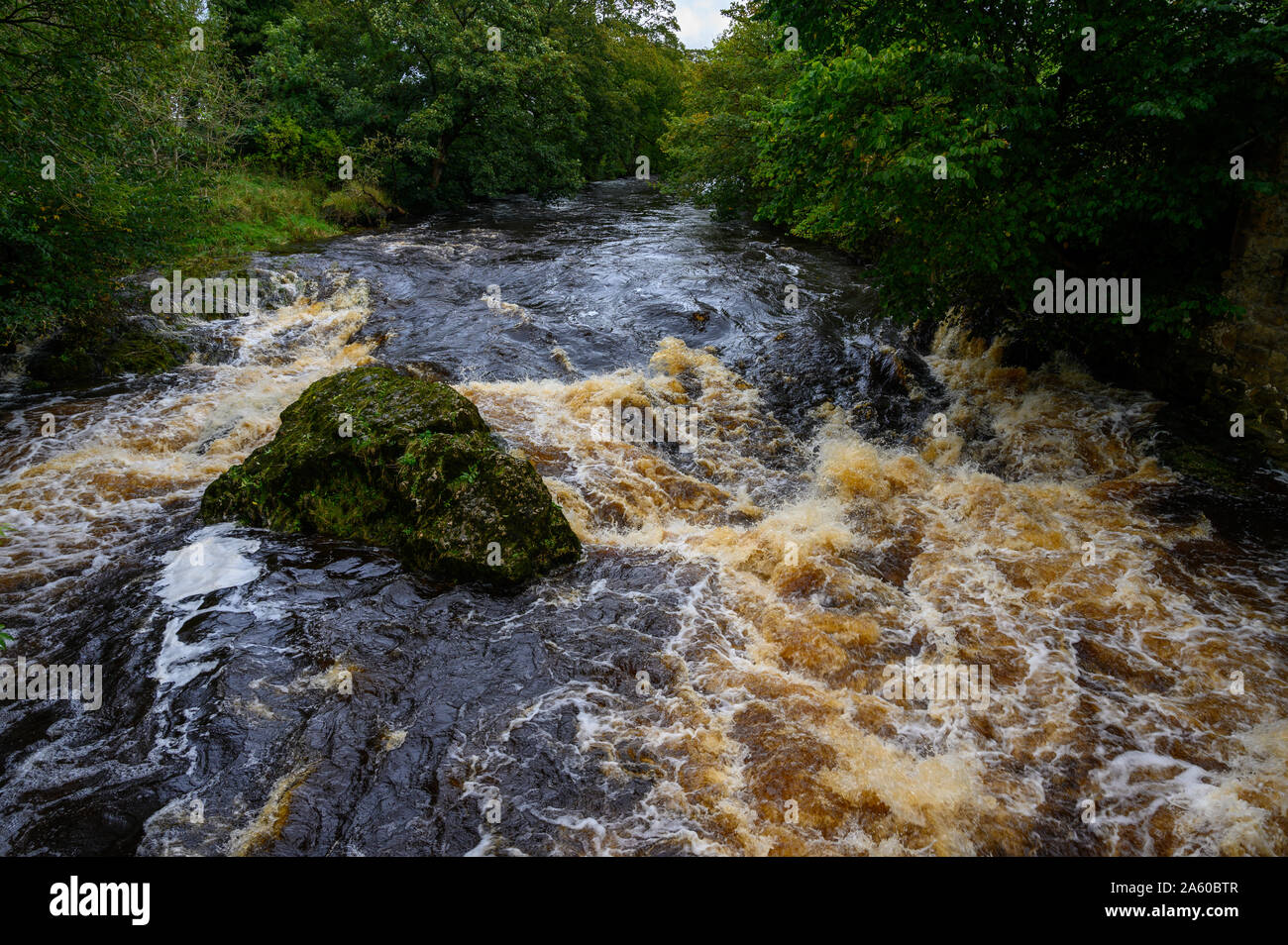The River Ribble in full flow at Settle, North Yorkshire Stock Photo ...