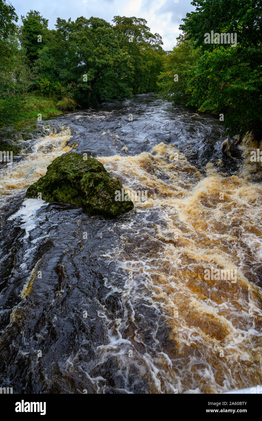 The River Ribble in full flow at Settle, North Yorkshire Stock Photo ...