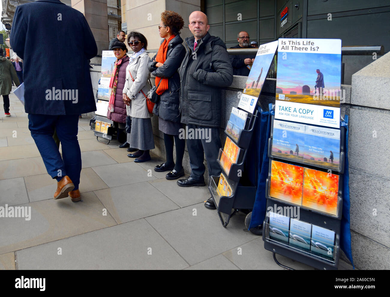 London, England, UK. Jehova's Witnesses distributing The Watchtower ...
