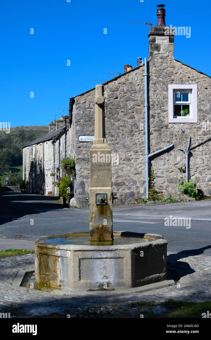The fountain and war memorial in village of Langcliffe near Settle ...