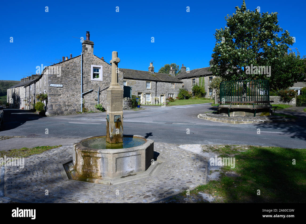 The fountain and war memorial in the village of Langcliffe near Settle ...