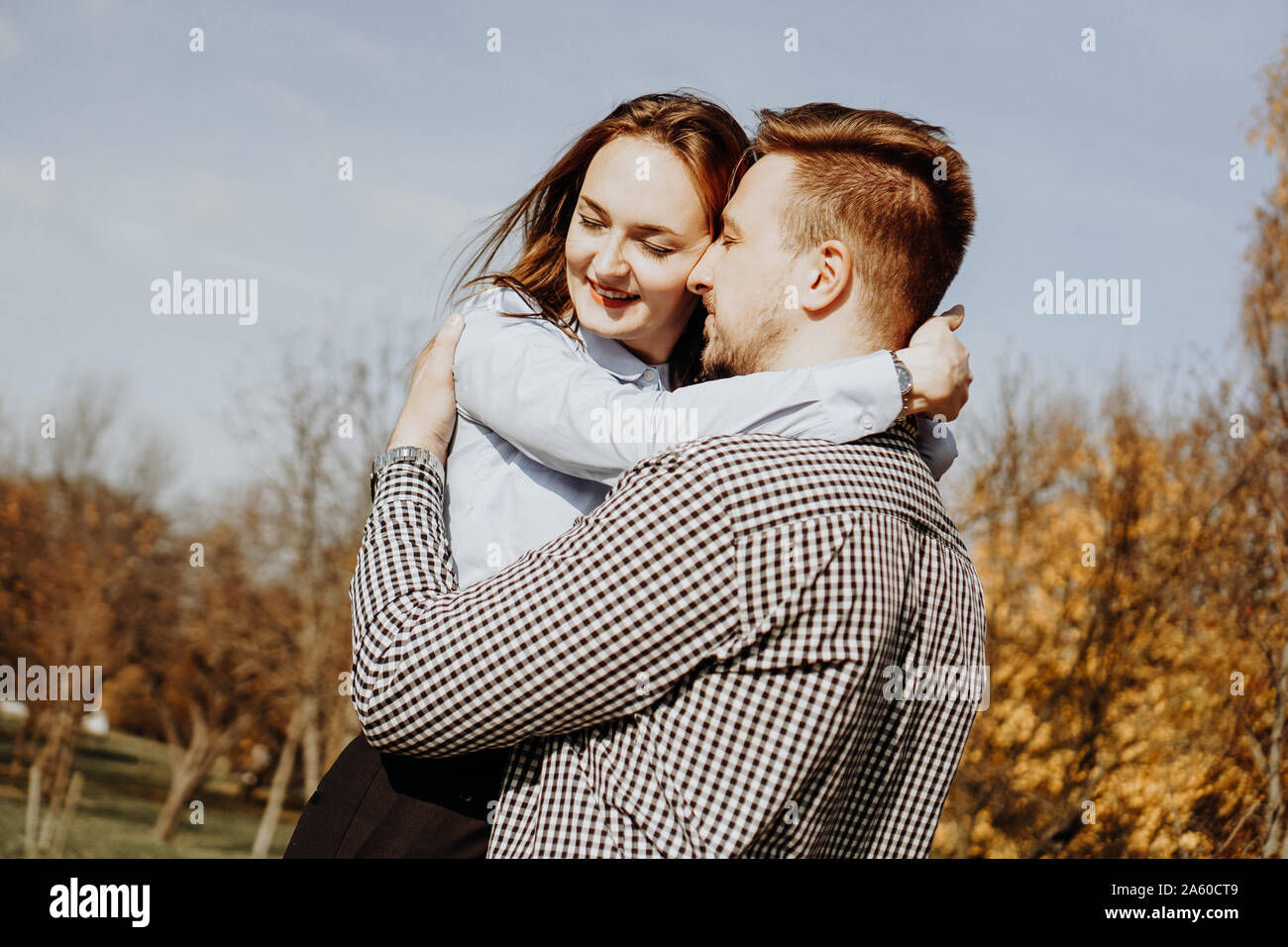 Romantic couple in the autumn park - sunny day - love, relationship and ...