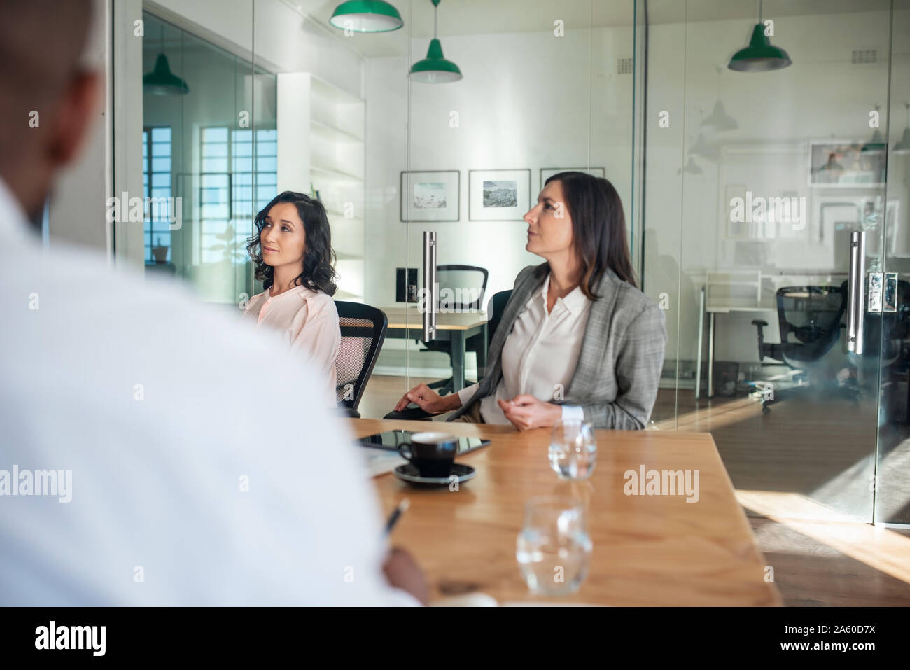 Diverse staff listening to a presentation in an office Stock Photo - Alamy