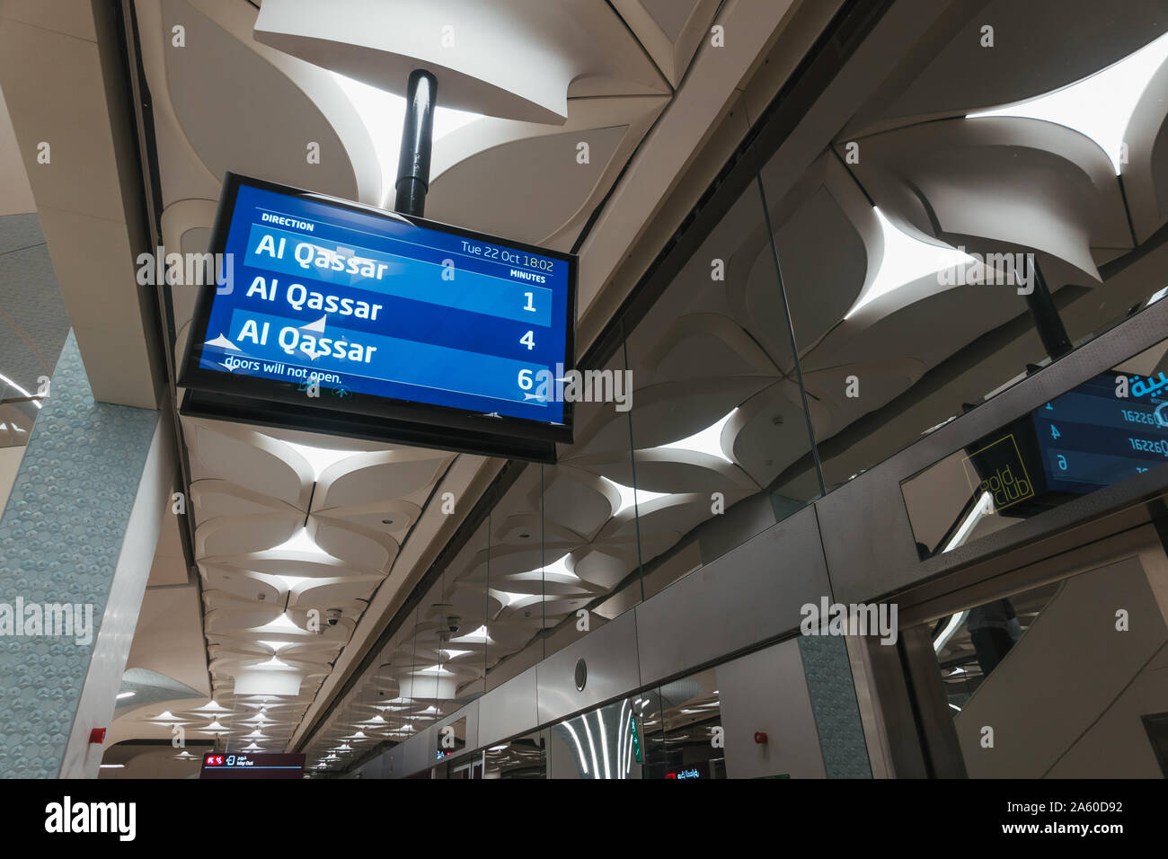 A digital screen on the train platform showing the next destinations ...