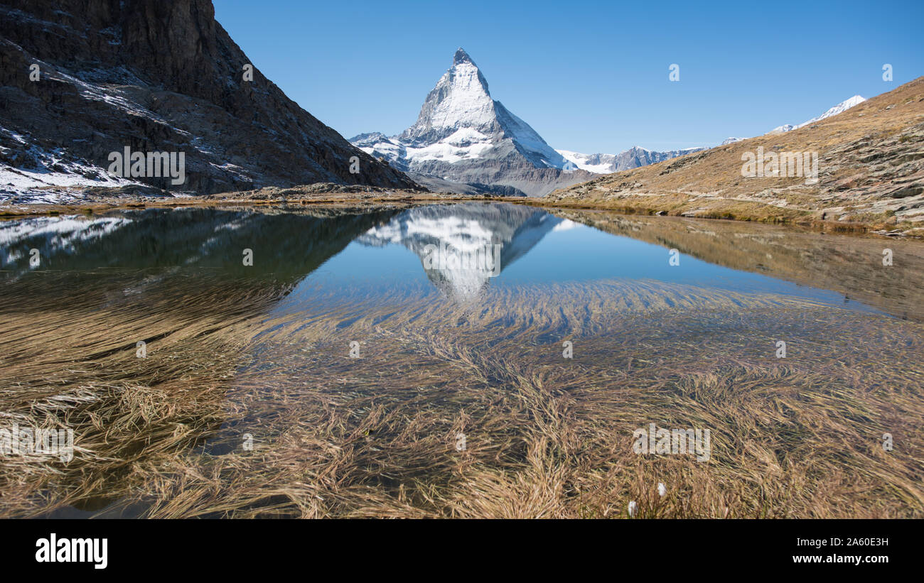 Riffelsee lake and the reflection from Matterhorn in the switzerland ...