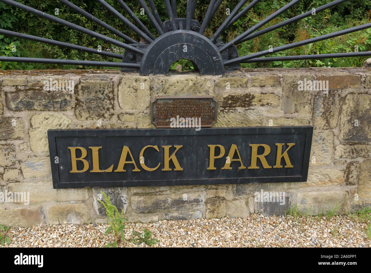 A mining memorial made from a winding wheel at the site of the closed ...