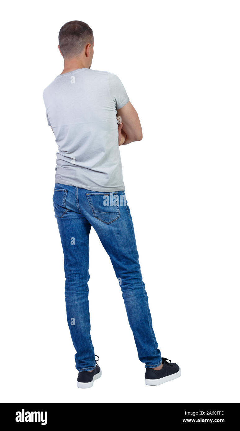 Back view of man in jeans. Standing young guy. Rear view people ...