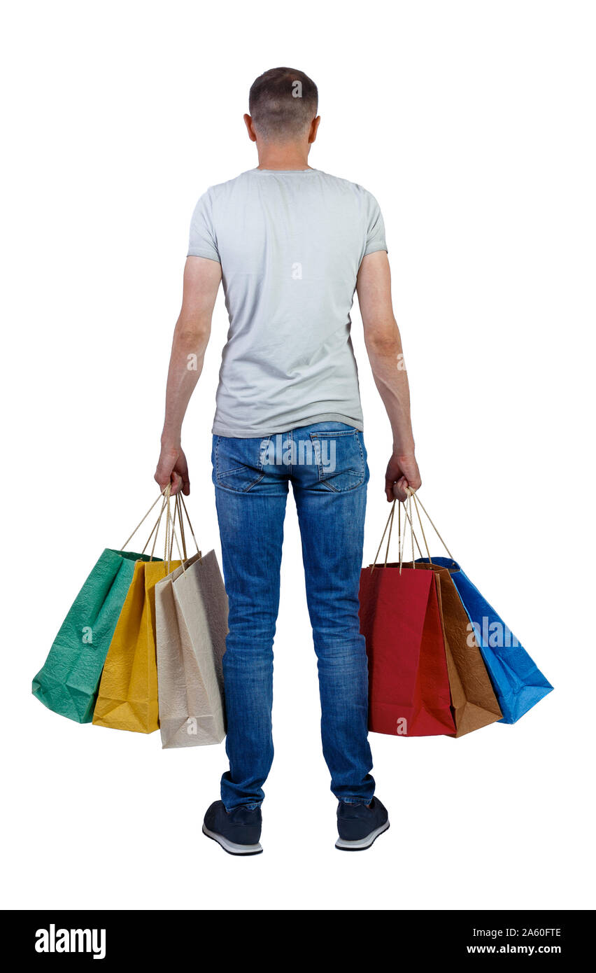 Back view of man with shopping bags. backside view of person. Rear view ...