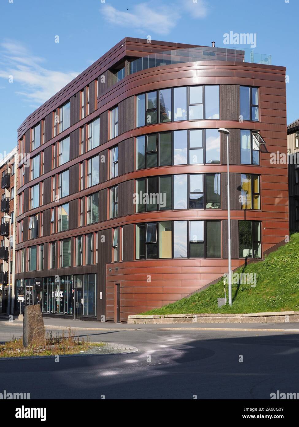 Modern building and roundabout in european Trondheim city center at ...