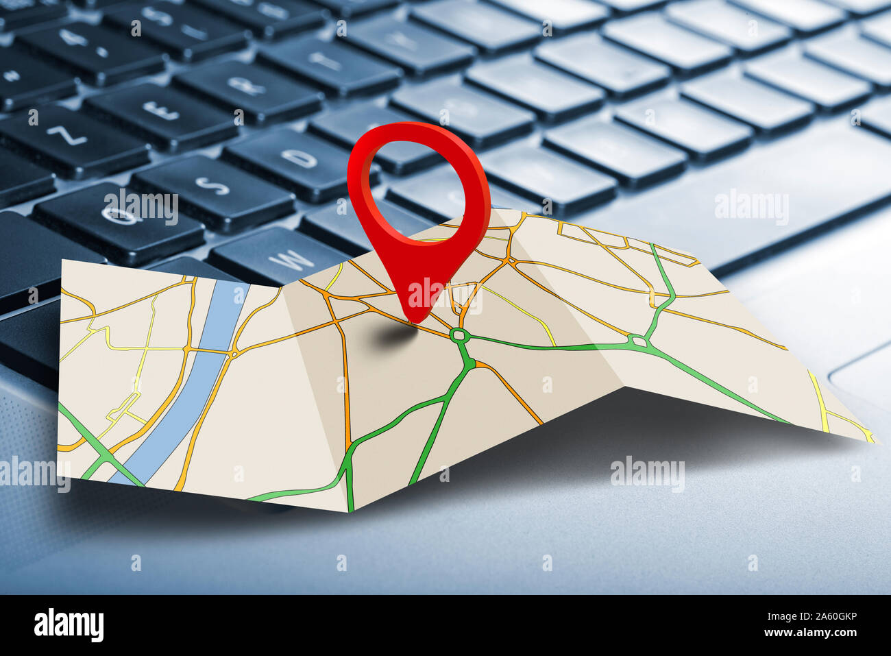 Keyboard from laptop with Map marker pointer Stock Photo - Alamy