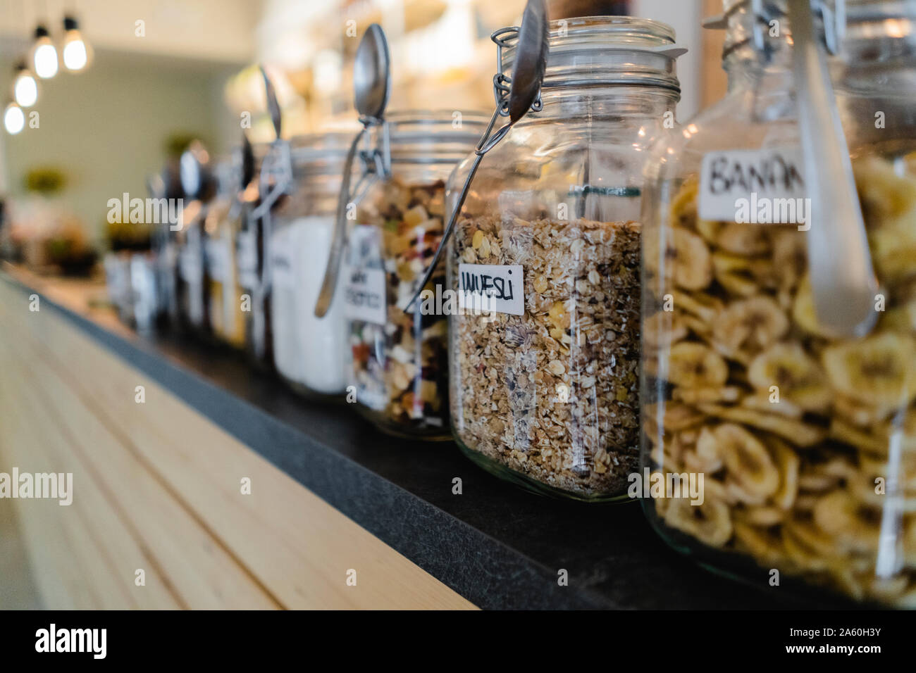 Assortment of breakfast cereals on counter in a cafe Stock Photo - Alamy