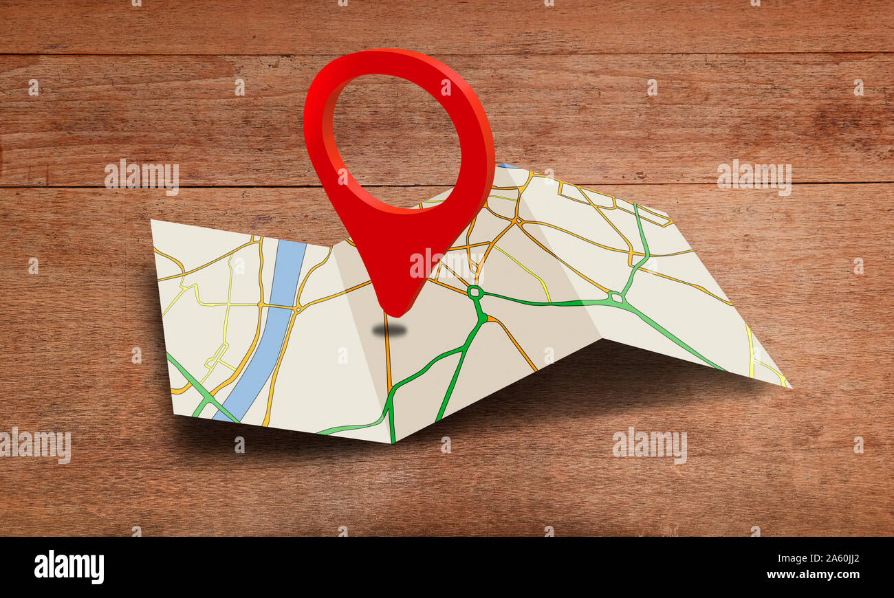 Map marker pointer on Wooden texture view from above Stock Photo - Alamy
