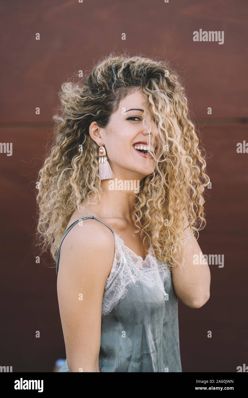 Portrait laughing blond woman ringlets hi-res stock photography and ...