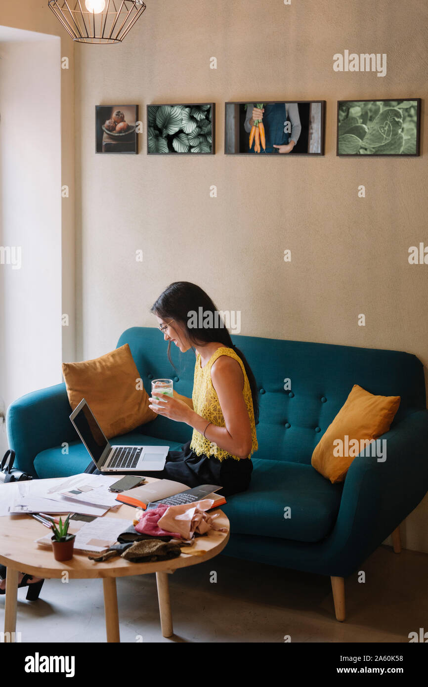 Happy fashion designer working hi-res stock photography and images - Alamy