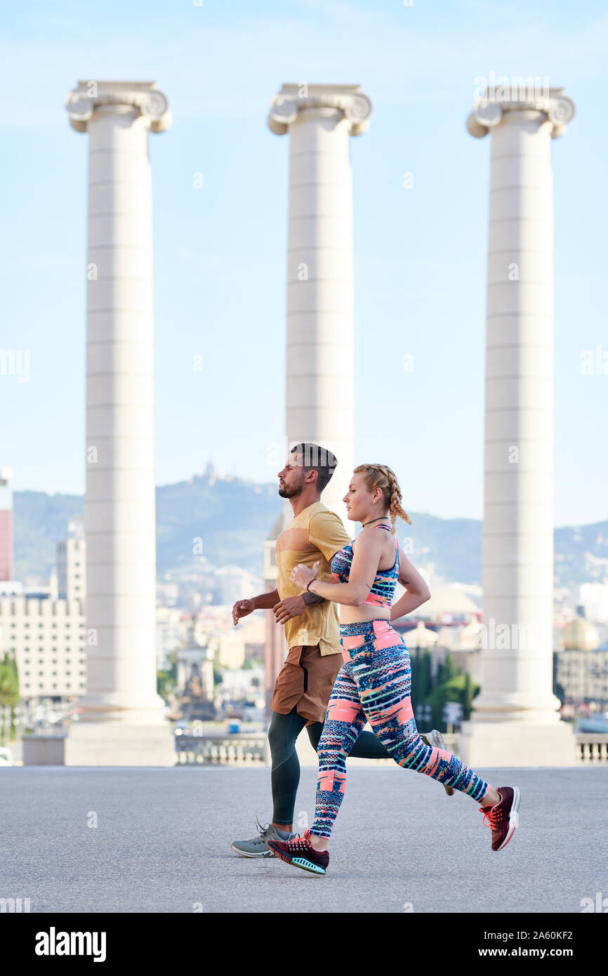 Man and woman running people hi-res stock photography and images - Alamy