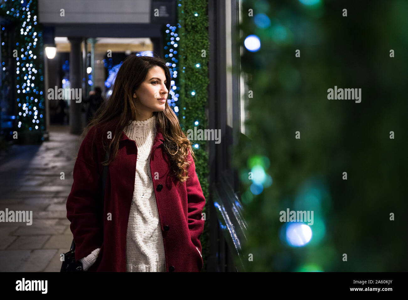 Looking illuminated christmas window hi-res stock photography and ...