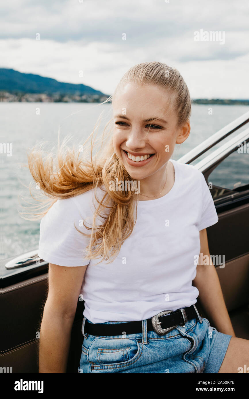 Blond woman on a boat hi-res stock photography and images - Alamy
