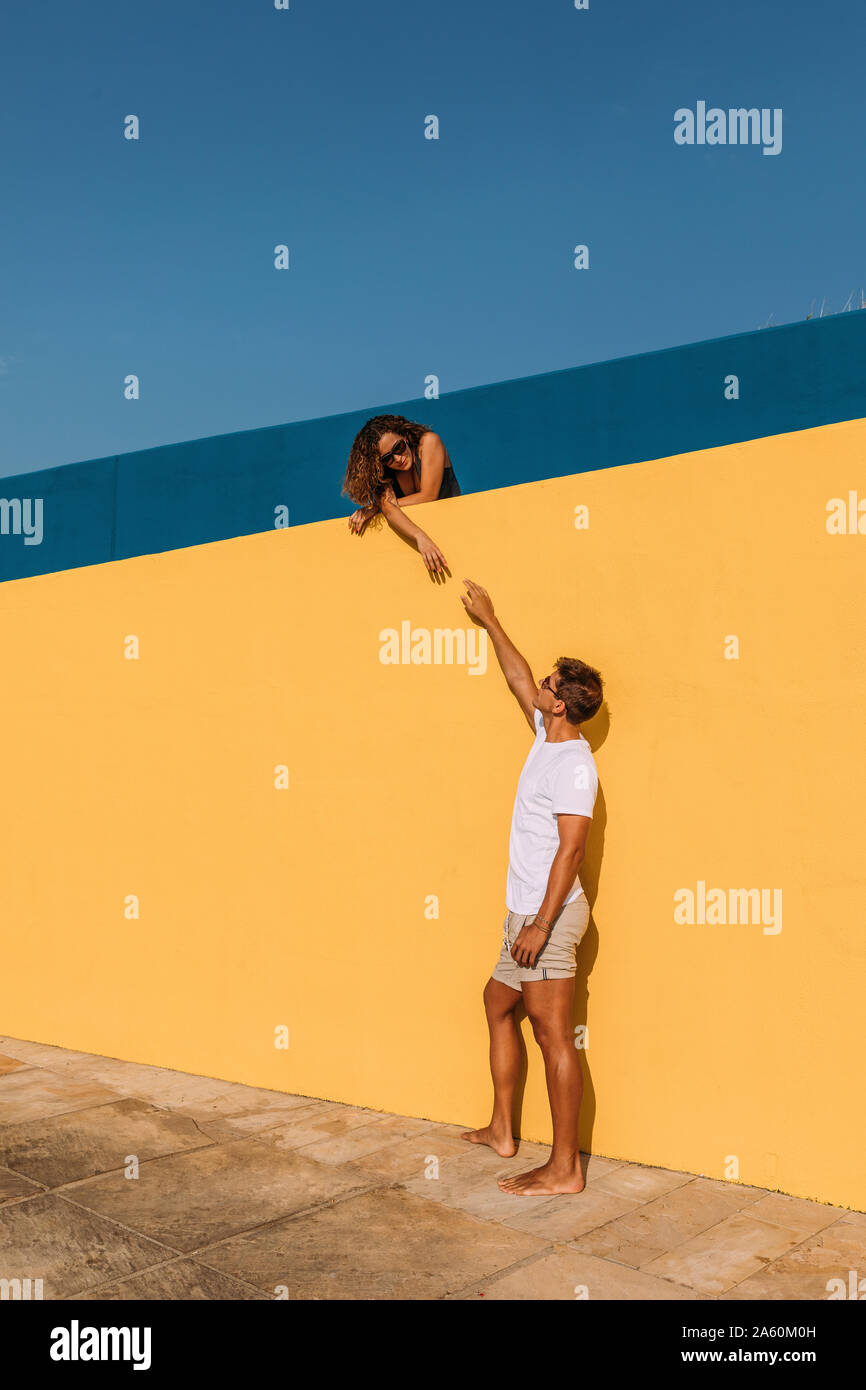 Casual man reaching out hand hi-res stock photography and images - Alamy