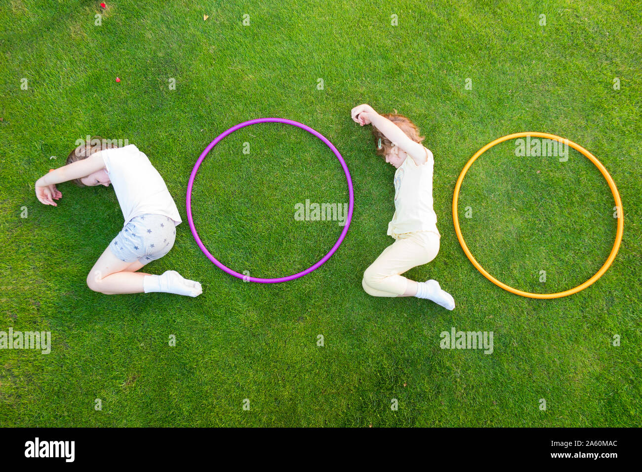 Children for the date of year 2020 with shapes and hula hoops to form ...