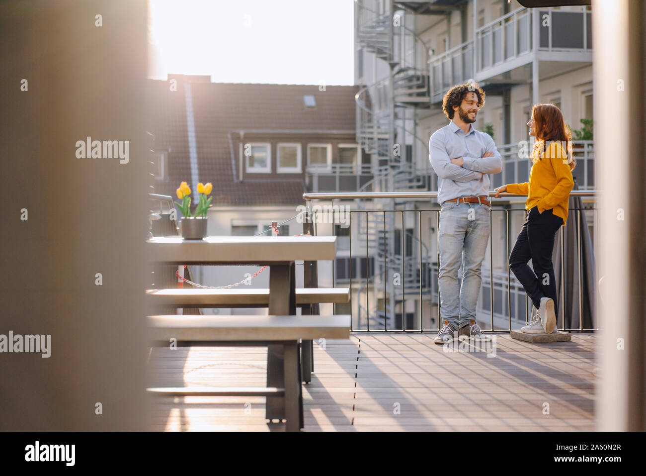 Two colleagues talking on roof terrace Stock Photo - Alamy Two colleagues talking on roof terrace Stock Photo - Alamy