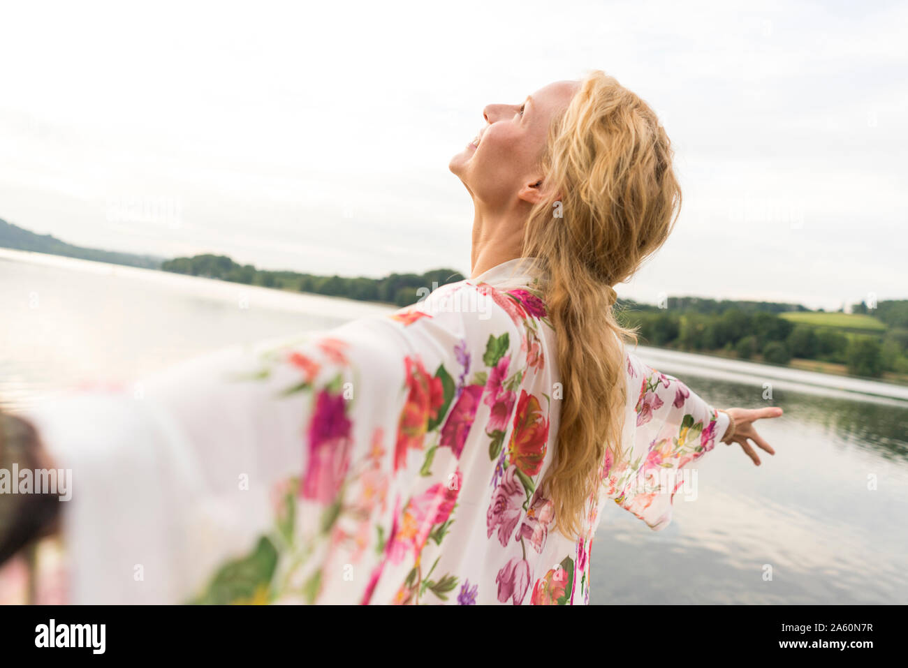 Woman young arms outstretched hi-res stock photography and images - Alamy