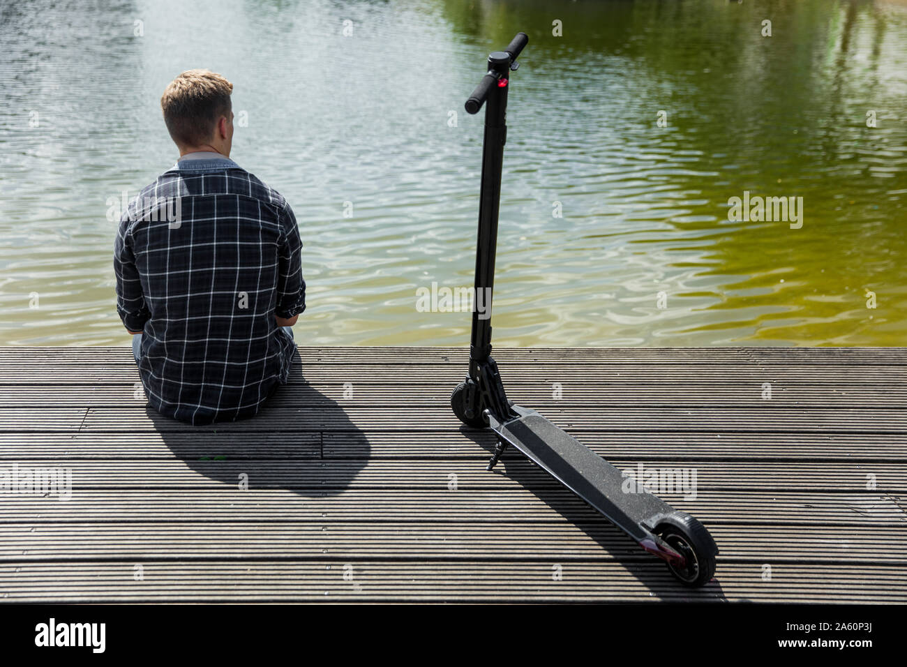 E scooter rear view hi-res stock photography and images - Alamy