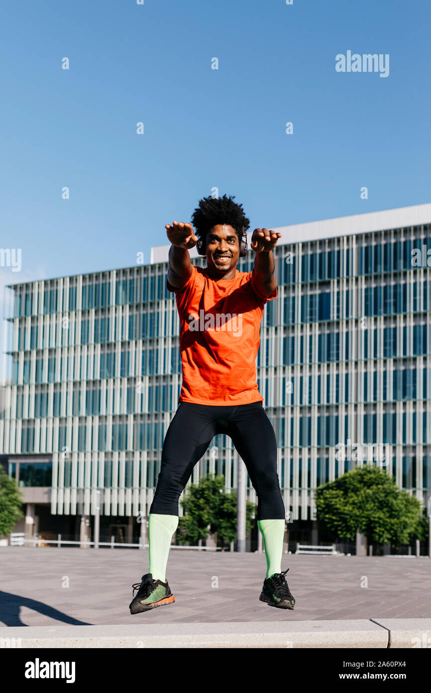 Fitness man jumping on bench hi-res stock photography and images - Alamy