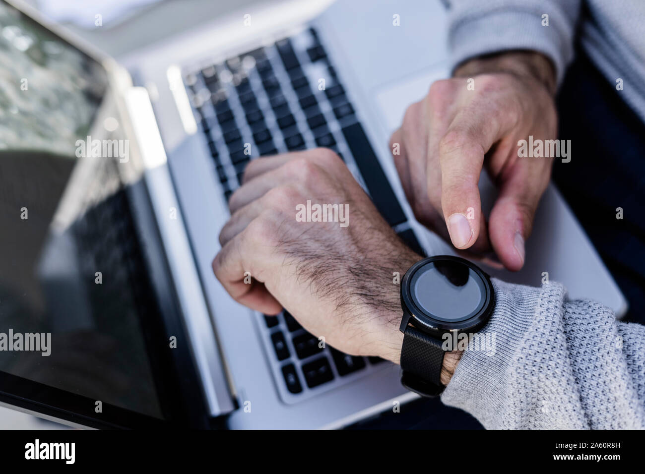 Man using smartwatch close up hi-res stock photography and images - Alamy