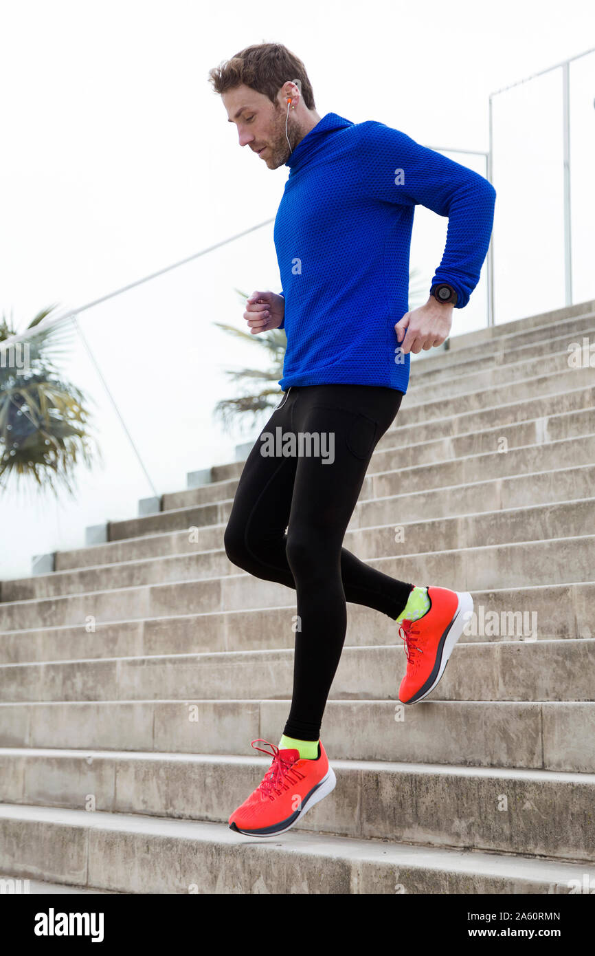 Healthy man running steps hi-res stock photography and images - Alamy