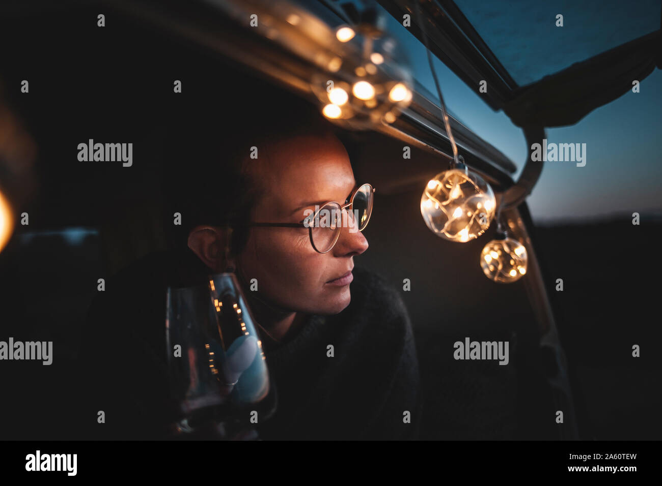 Young female lying sideways in hi-res stock photography and images - Alamy