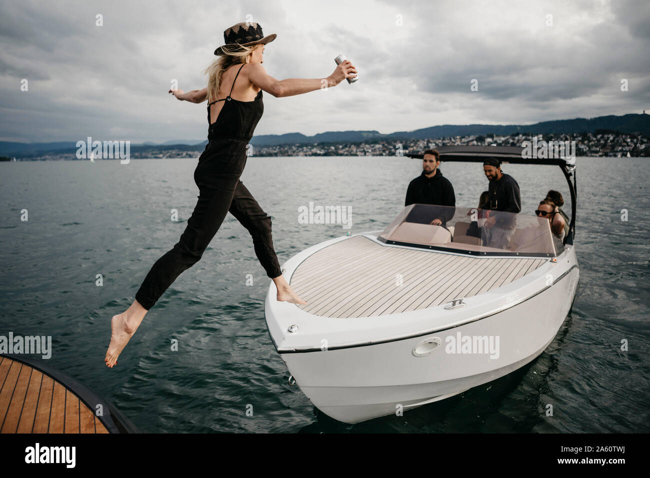 Young people party boat hi-res stock photography and images - Alamy